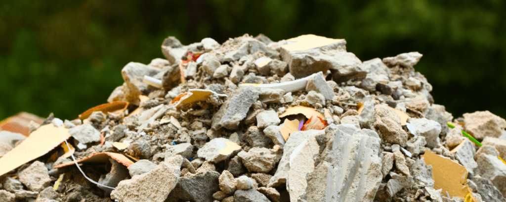 The lifecycle of construction waste from generation to disposal.